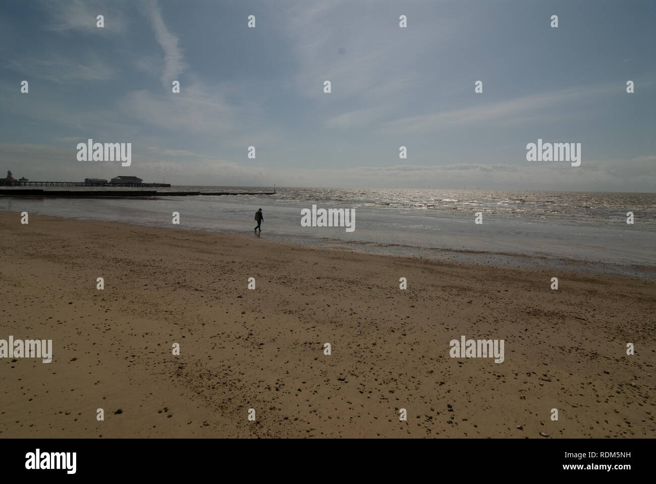Walking on the Beach of Clacton on Sea Stock Photo - Alamy