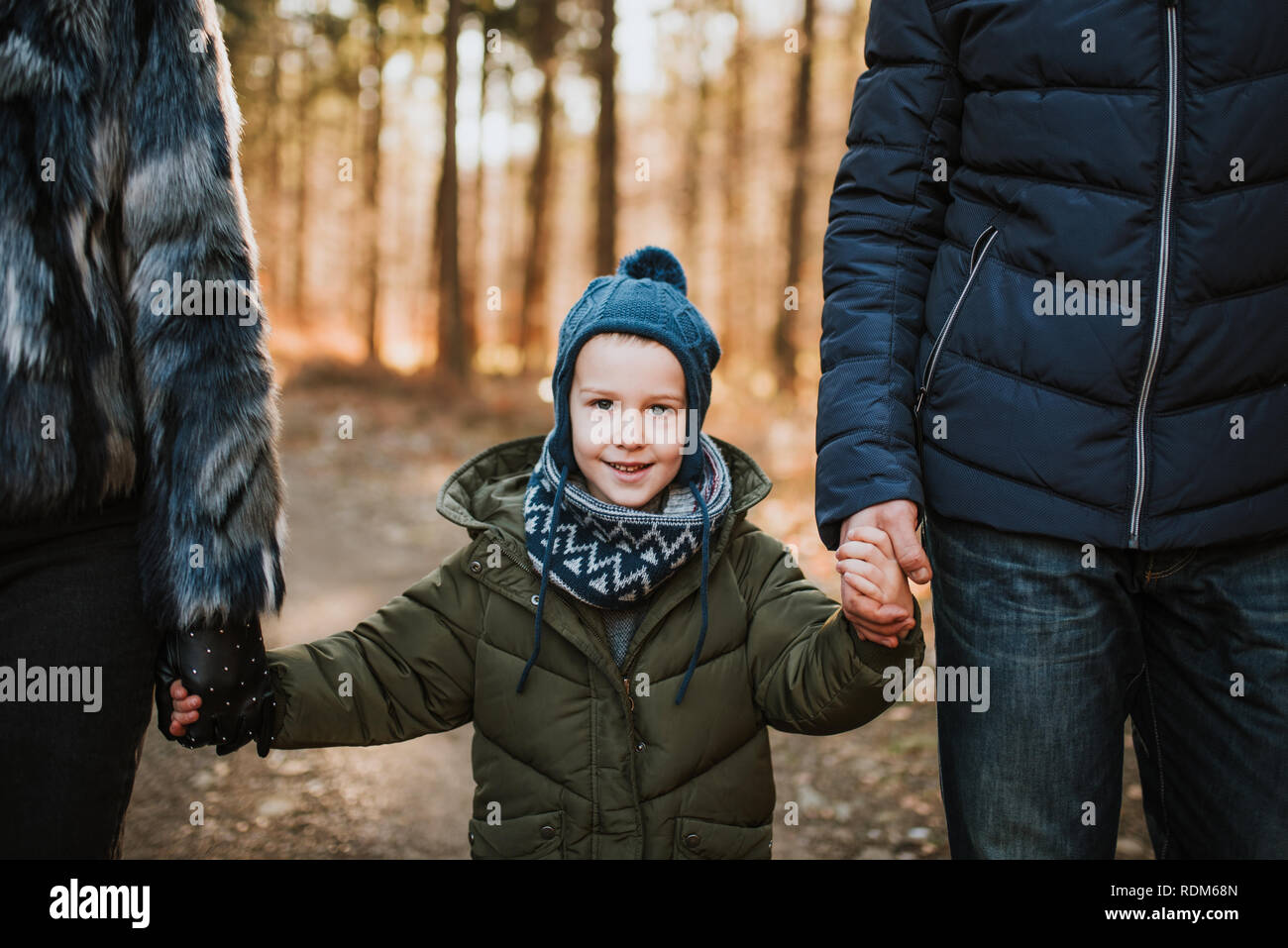 Happy little boy with his parents Stock Photo - Alamy