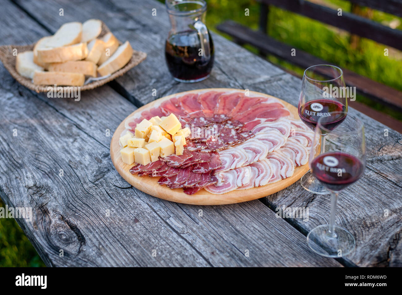 Meal table with platters of cold cuts and chees Stock Photo - Alamy