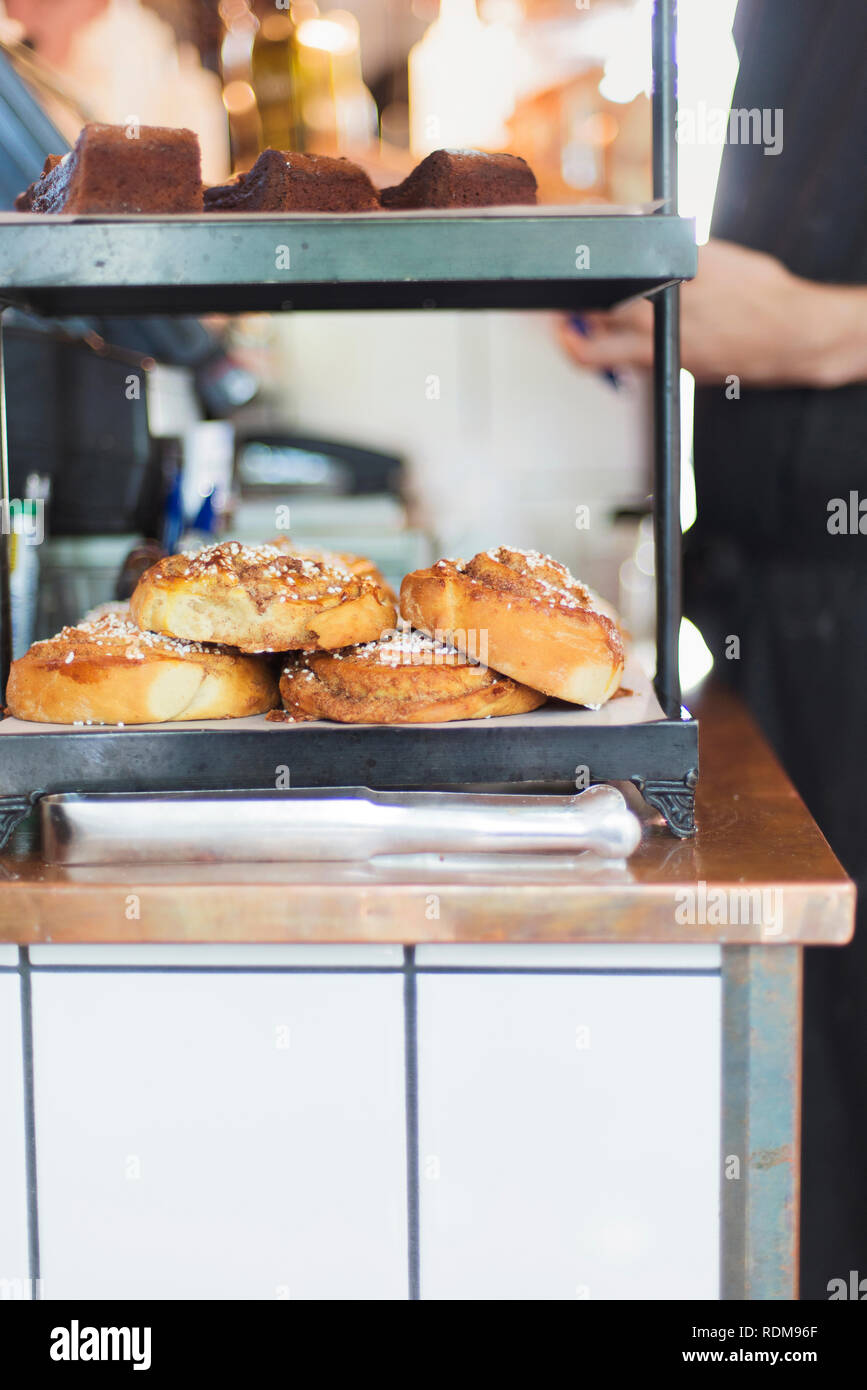 Cakes on counter in coffee shop Stock Photo - Alamy