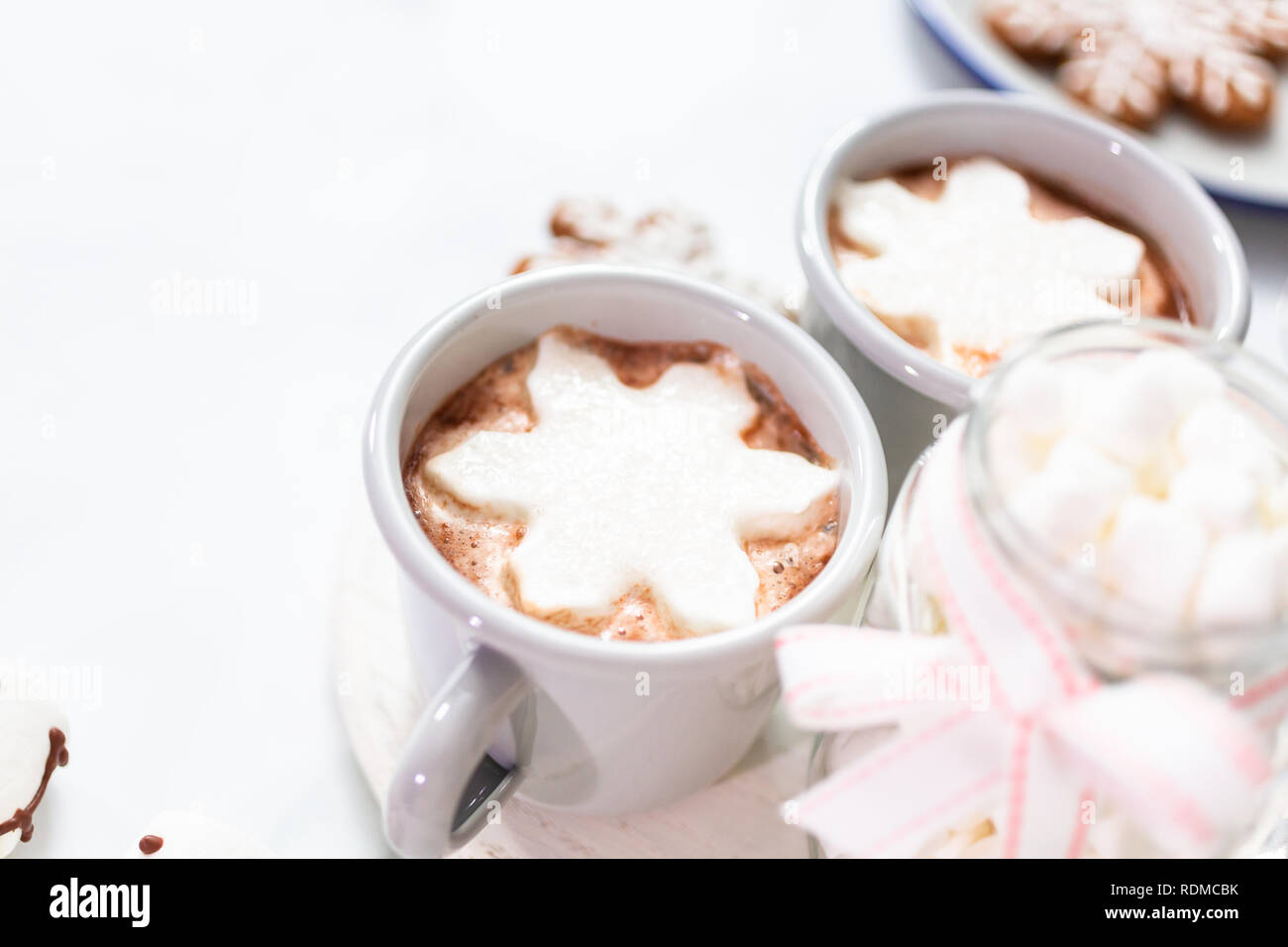 American hot chocolate with snow flake shaped marshmallow toppings ...