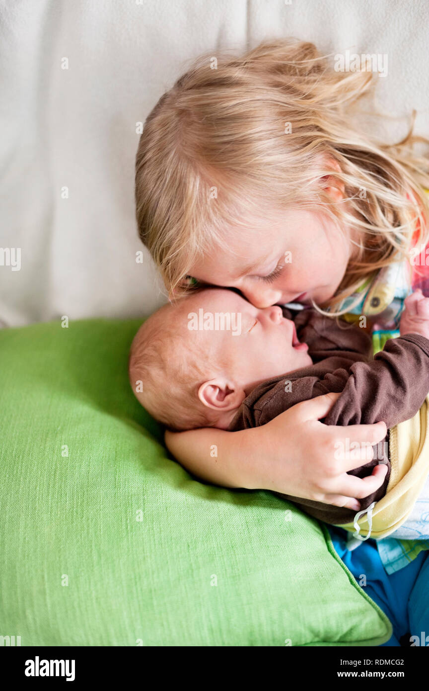 Sister taking care little brother hi-res stock photography and images ...
