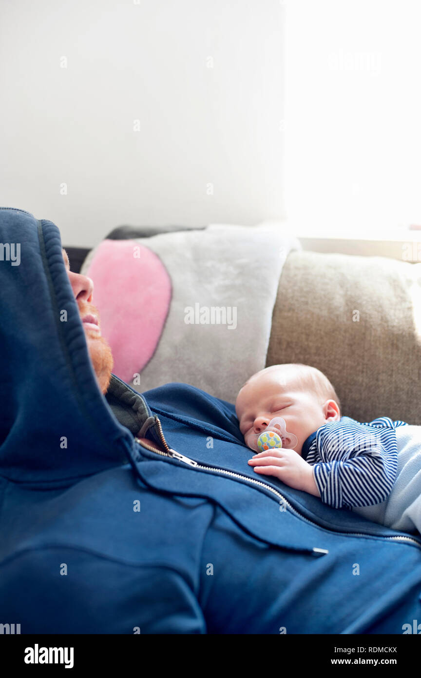 Father boy sleeping sofa hi-res stock photography and images - Alamy