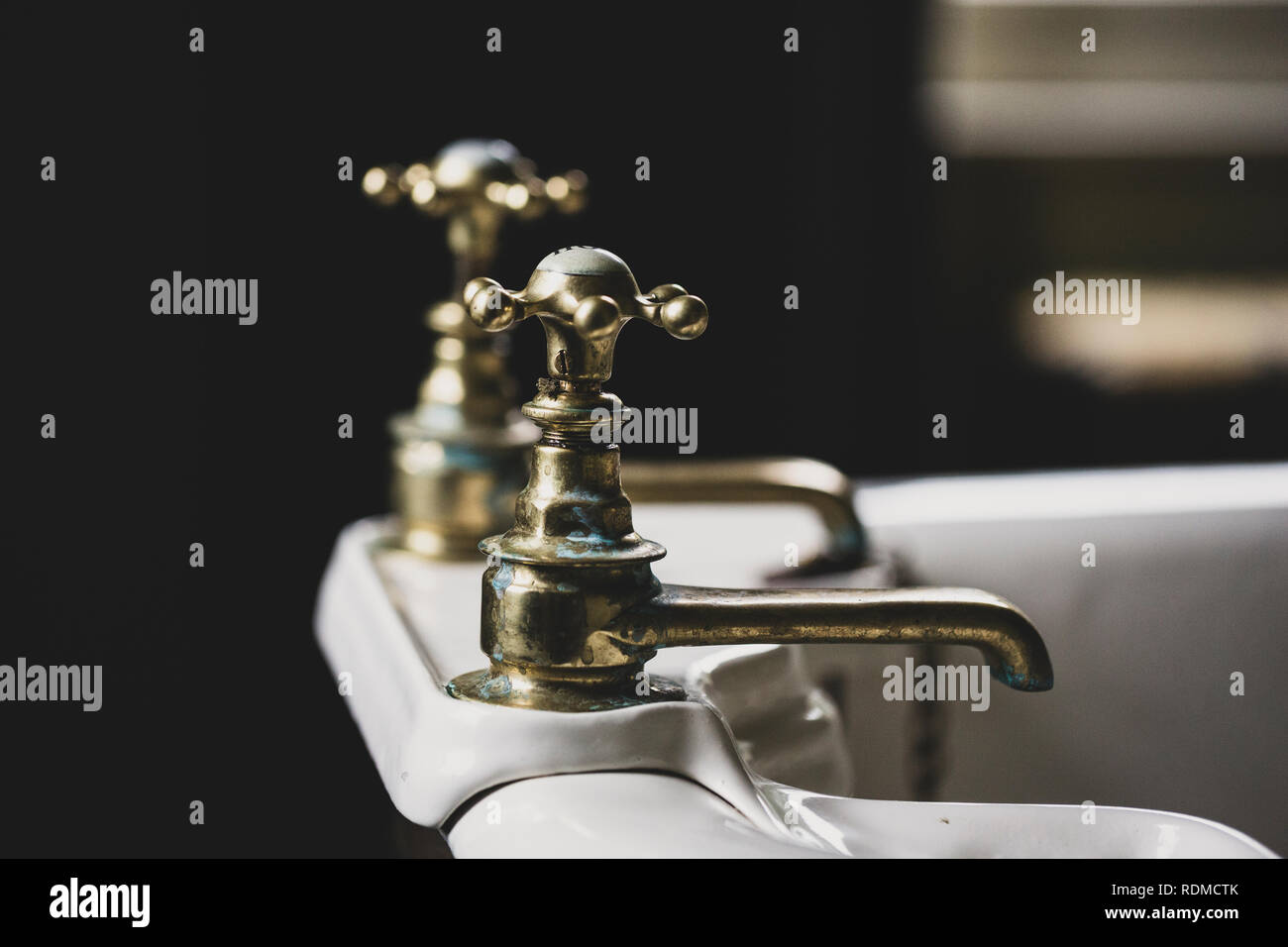 Close up of vintage Victorian brass tabs Stock Photo - Alamy