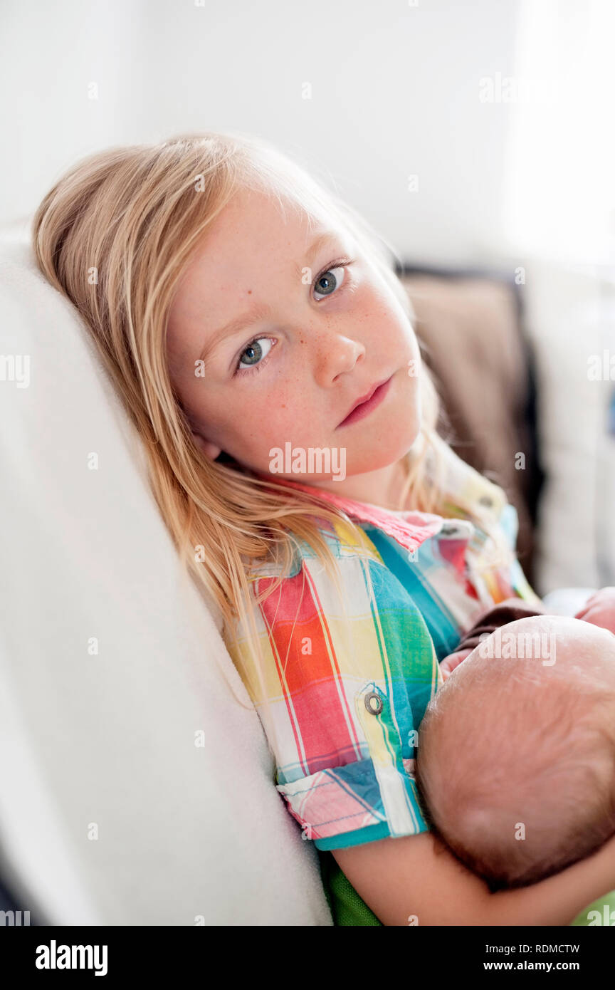Sister taking care little brother hi-res stock photography and images ...