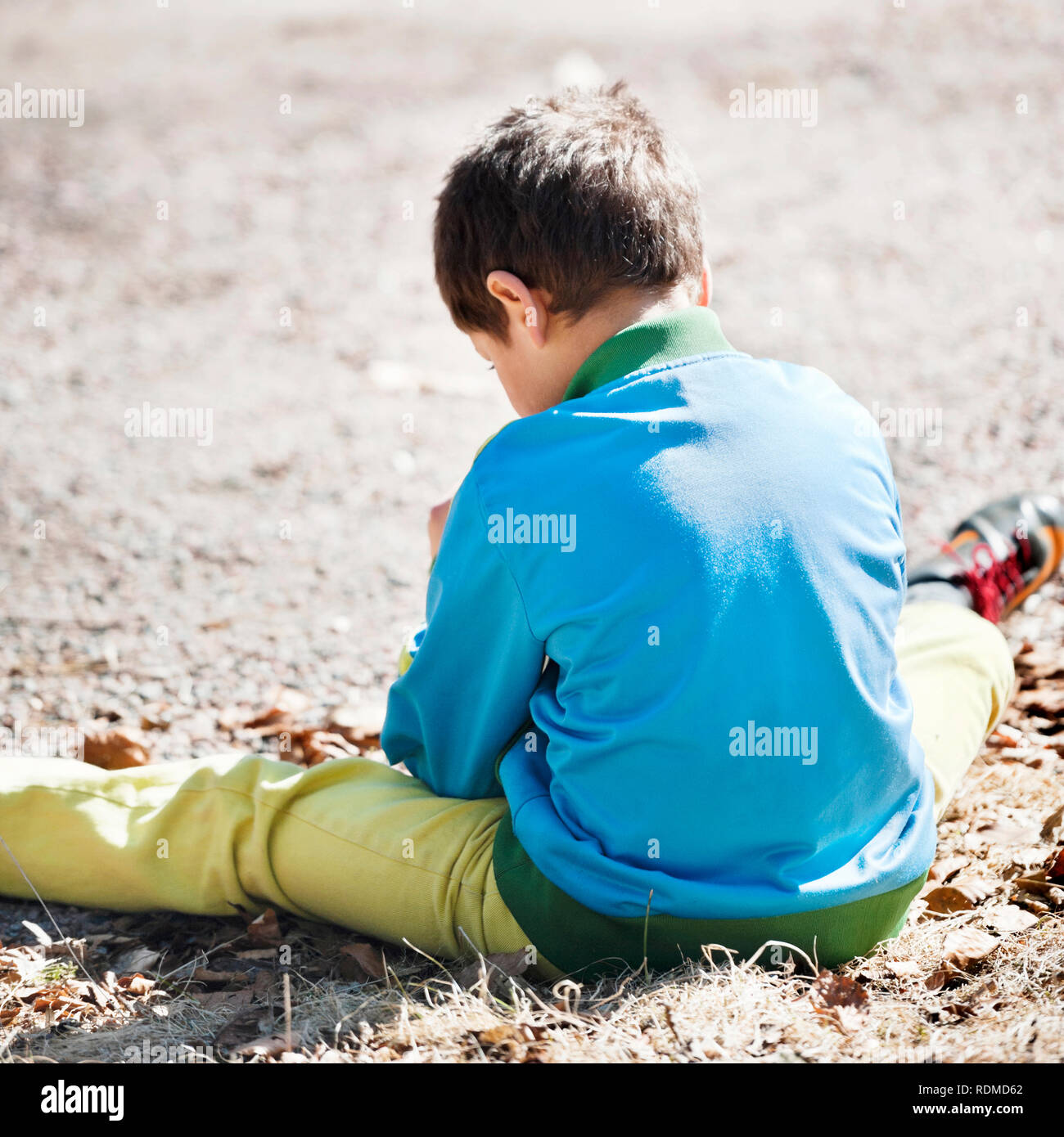 Boy playing outside hi-res stock photography and images - Alamy