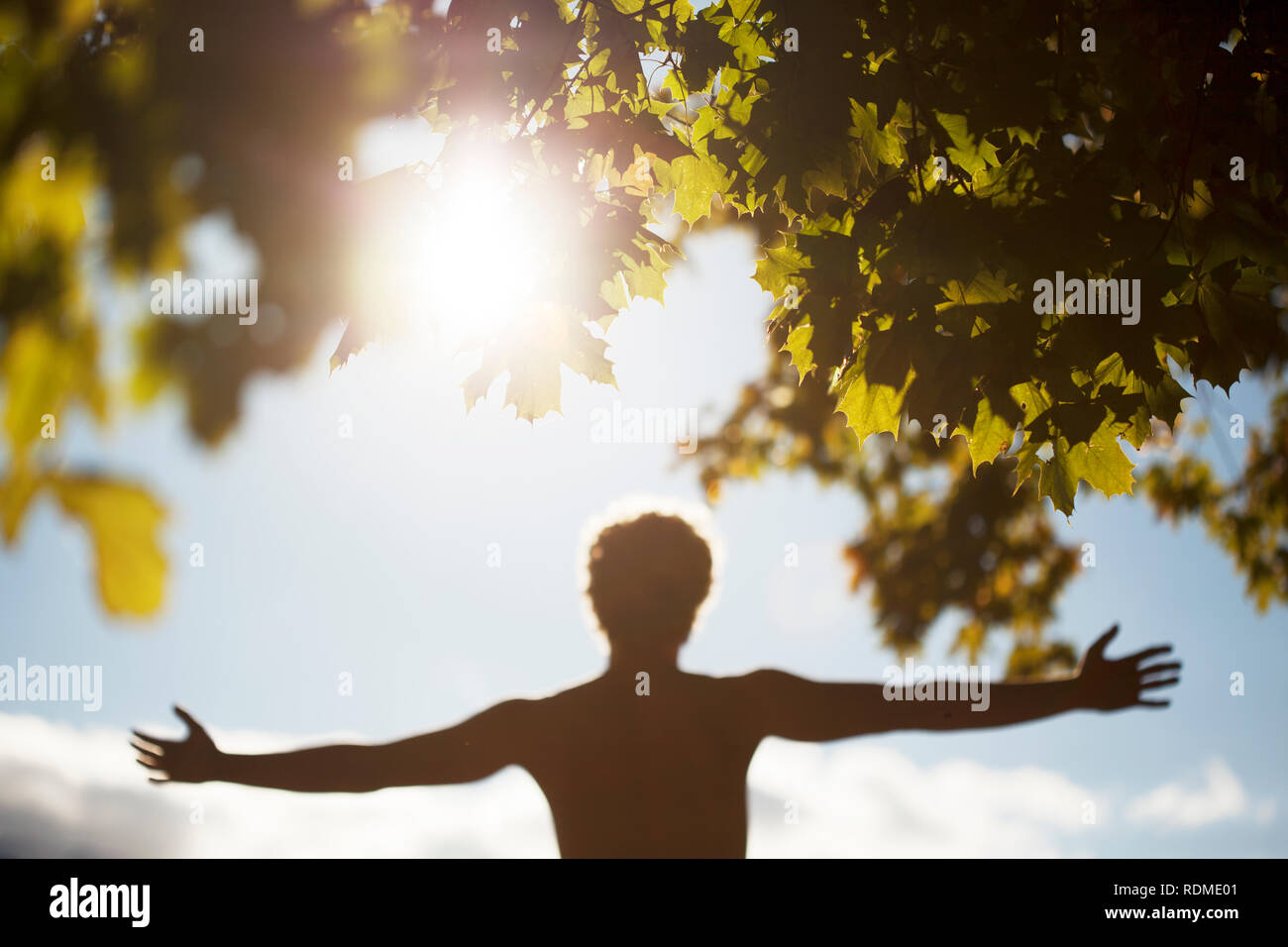 A man standing in the sun Stock Photo - Alamy