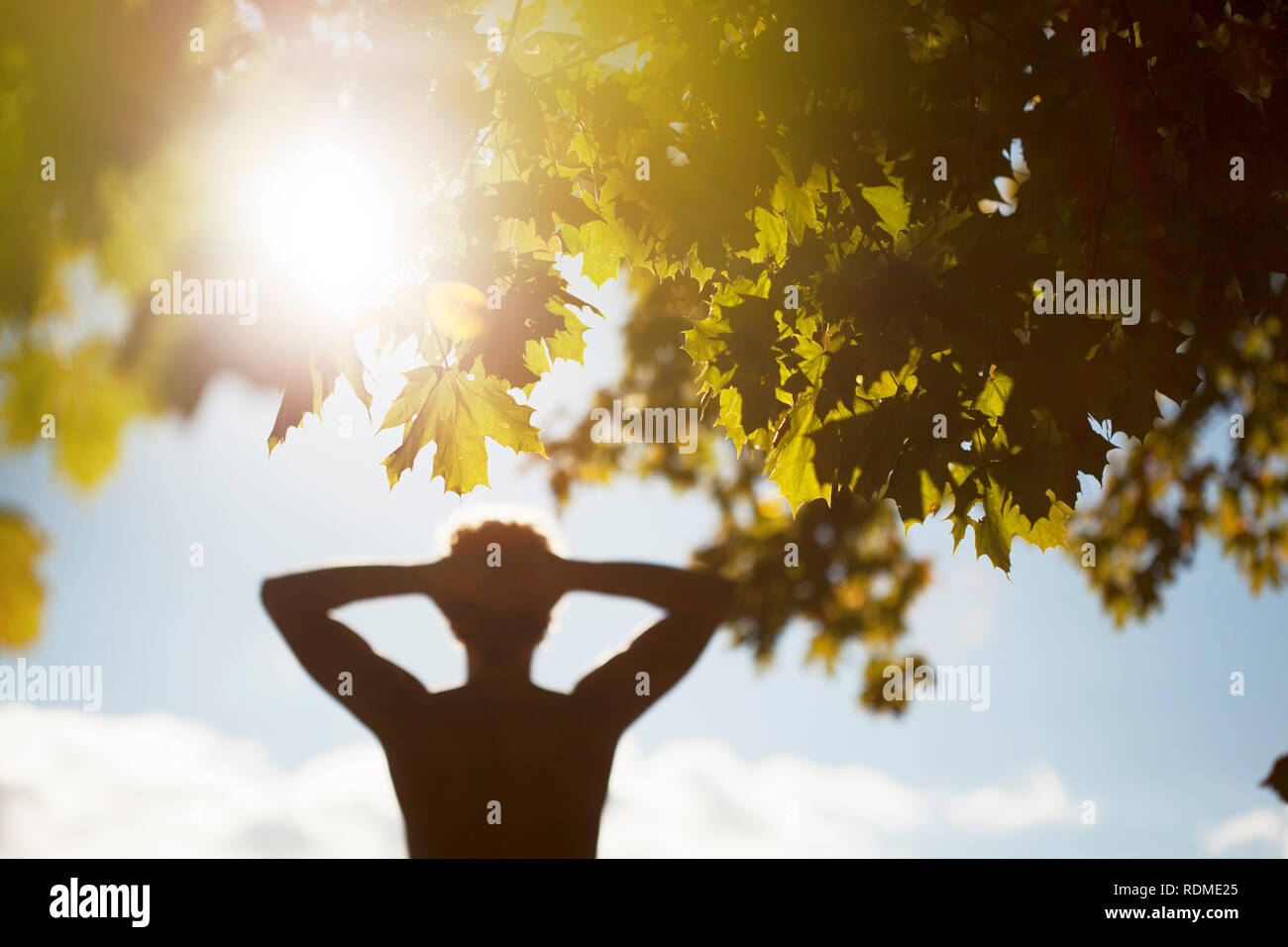 A man standing in the sun Stock Photo - Alamy