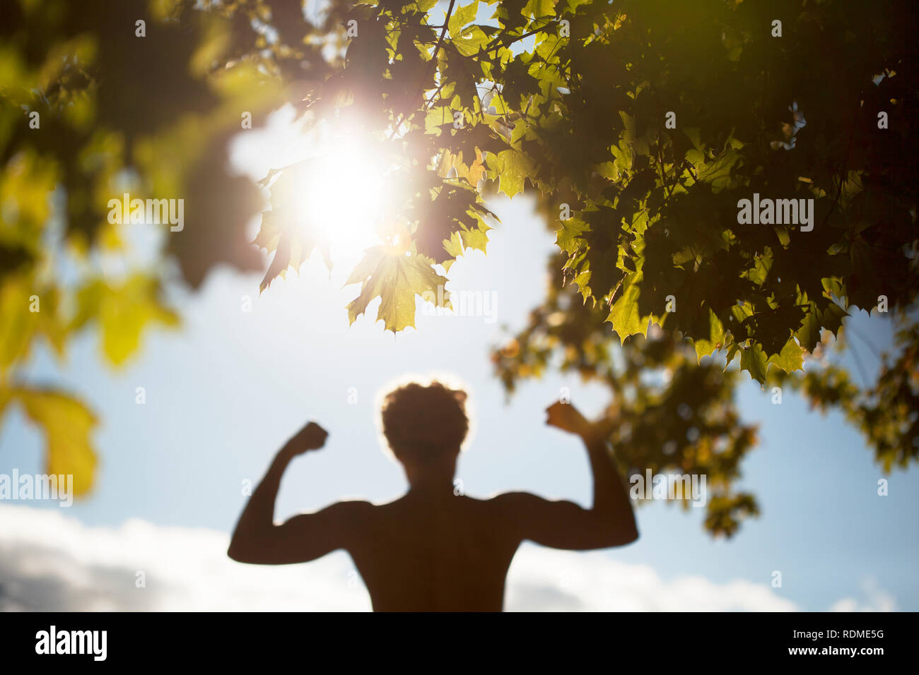 A man standing in the sun Stock Photo - Alamy