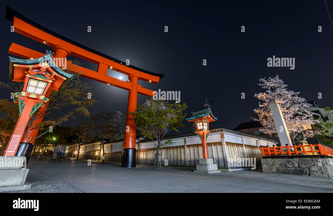 Red torii gates at night, Kyoto, Japan Stock Photo - Alamy