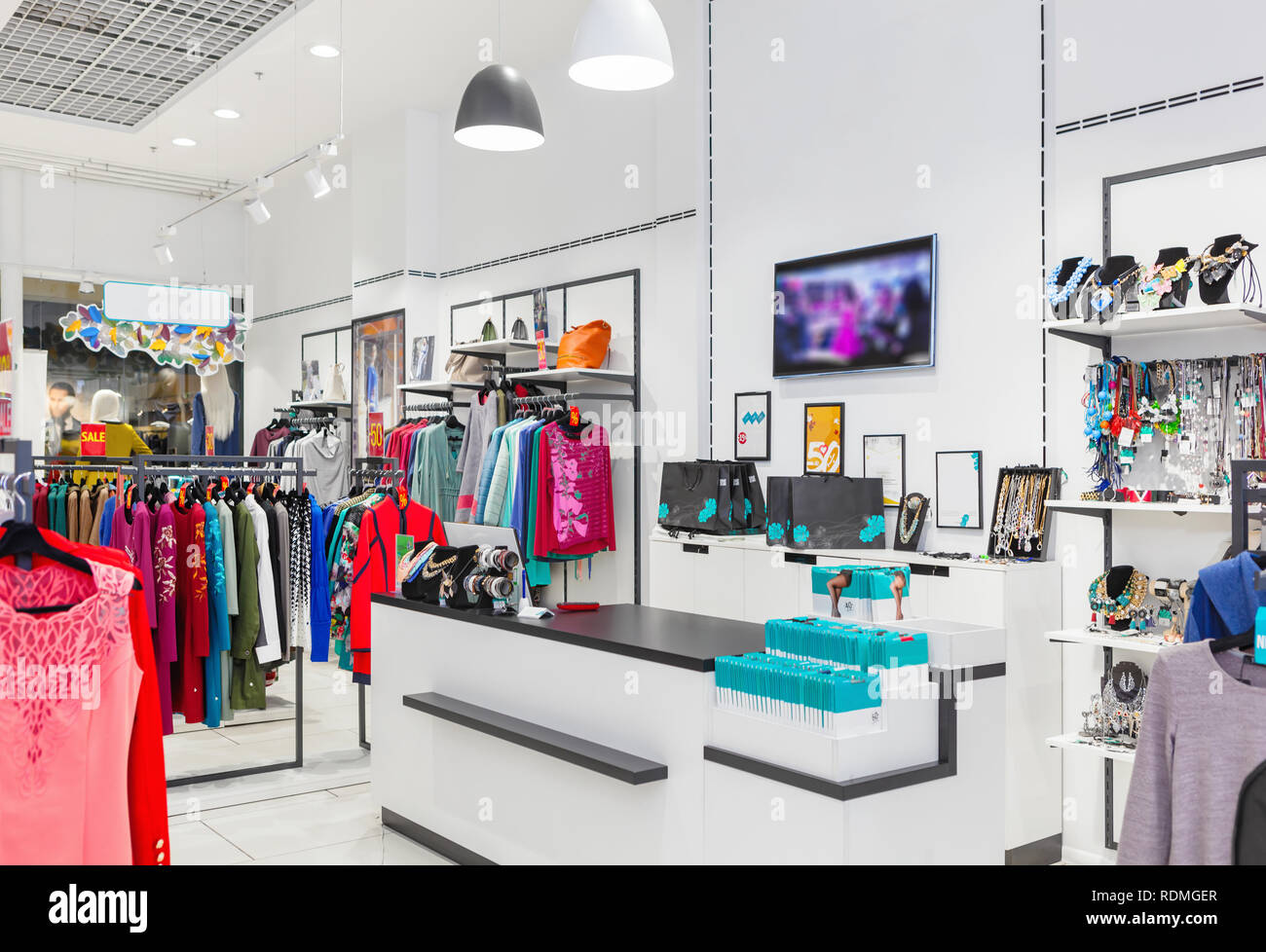 Interior of fashion clothing store for women Stock Photo - Alamy