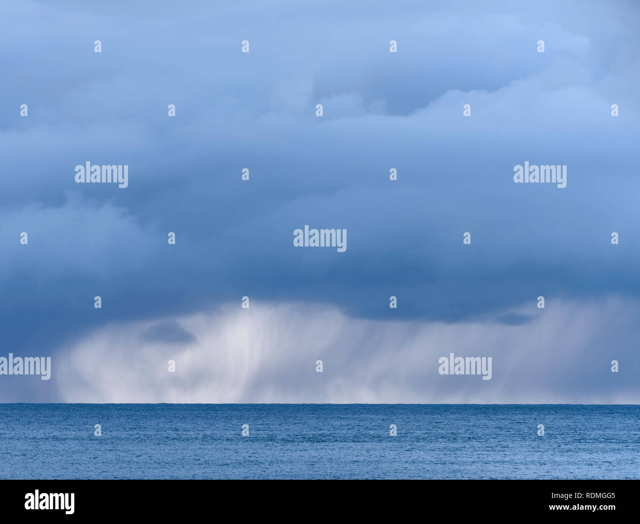 Storm clouds over sea hi-res stock photography and images - Alamy