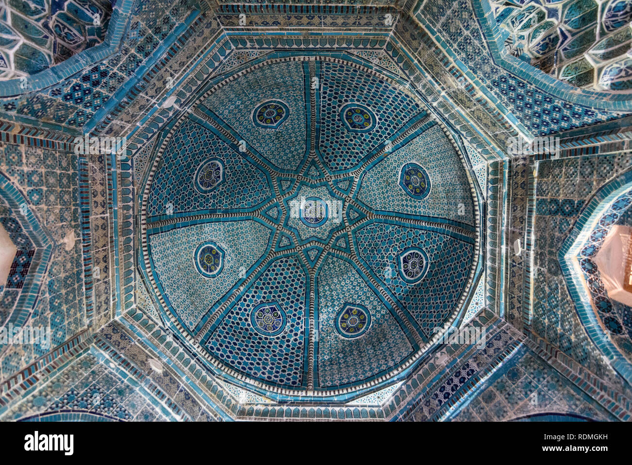 A dome and patterned mosaic tile arches and walls, Islamic style ...