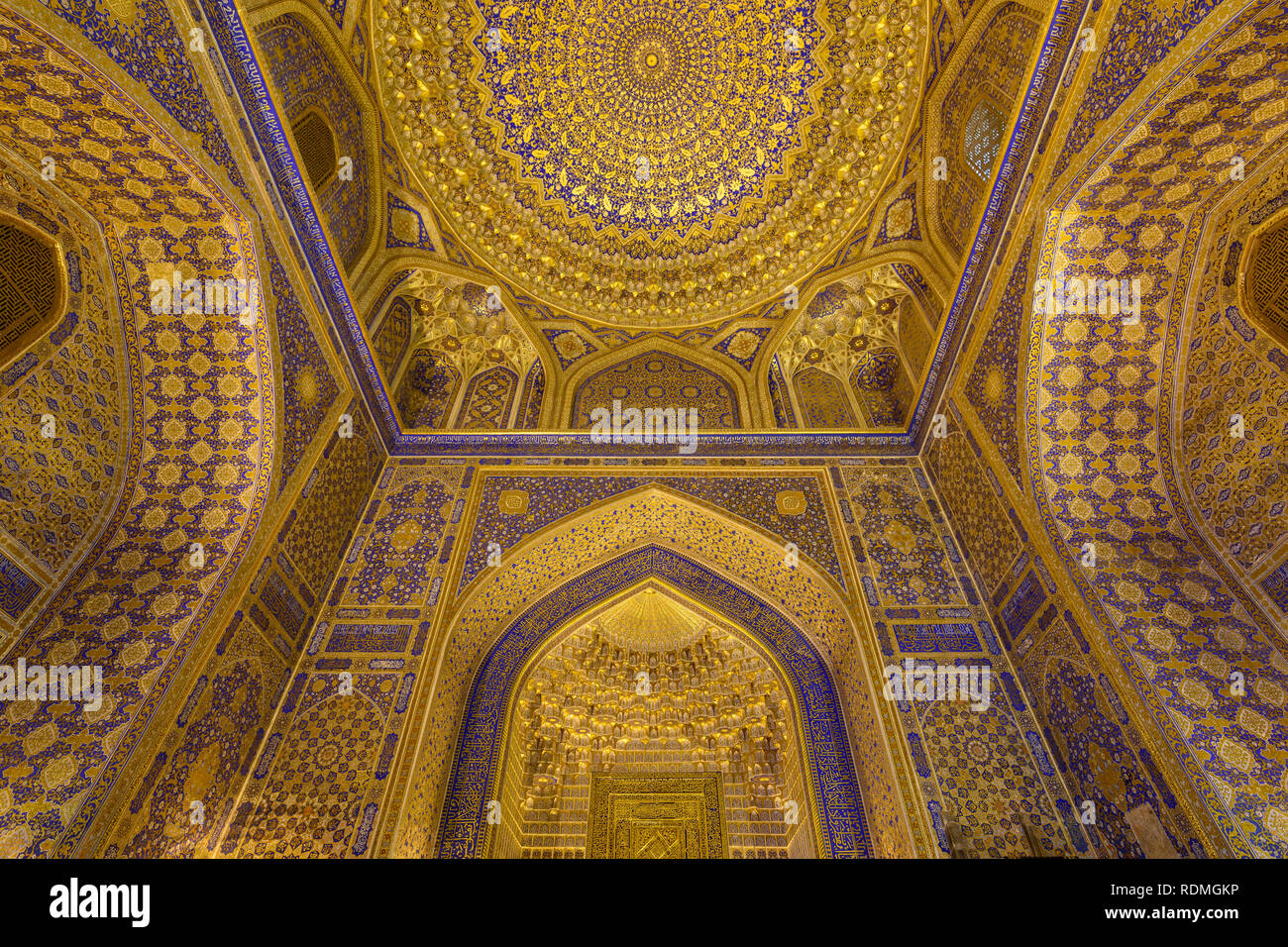 Interior, the blue and yellow glazed walls and dome of a Madrasa ...