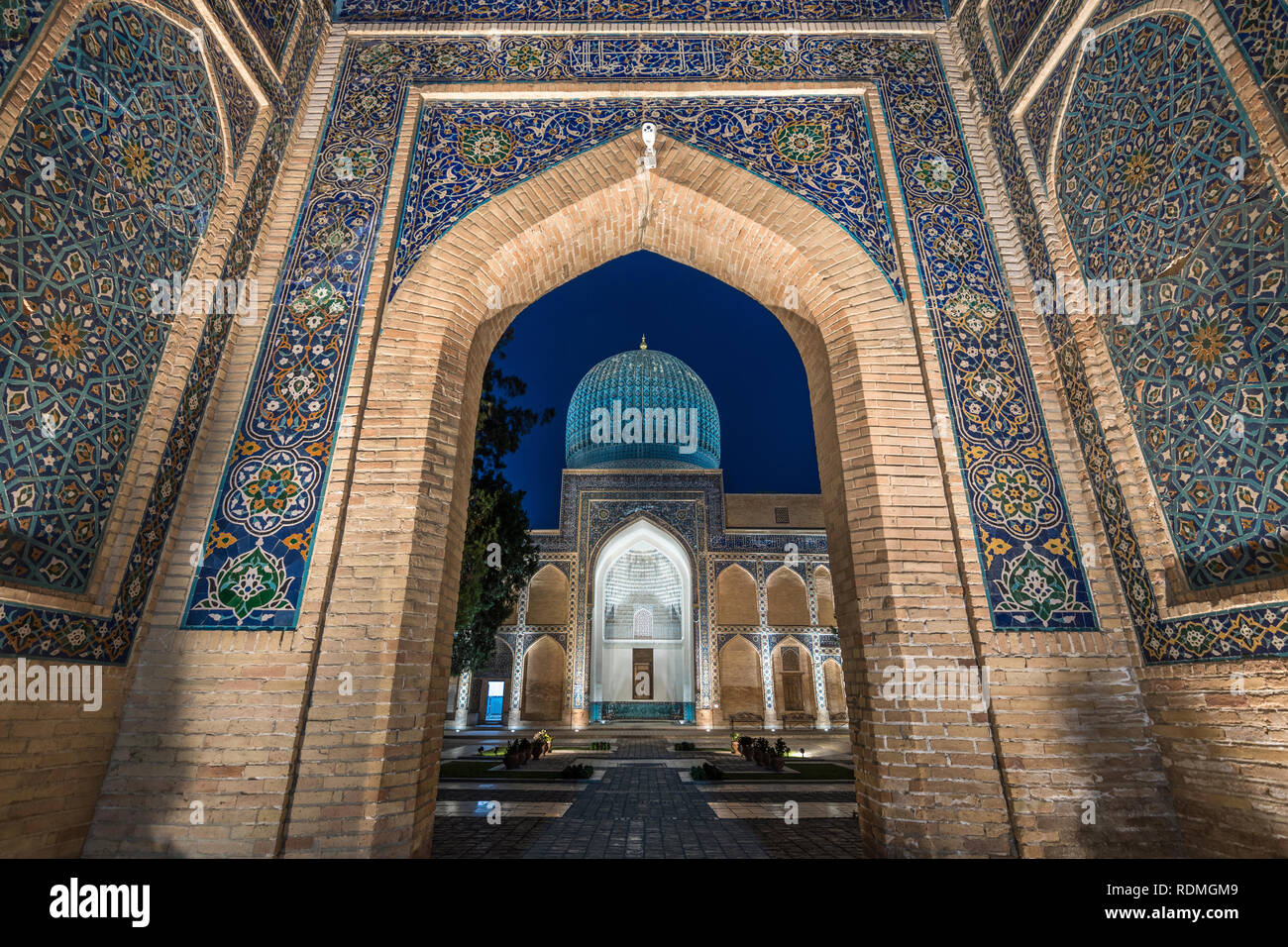 Archway inlaid with vibrant mosaic tile patterns, The Registan, a ...