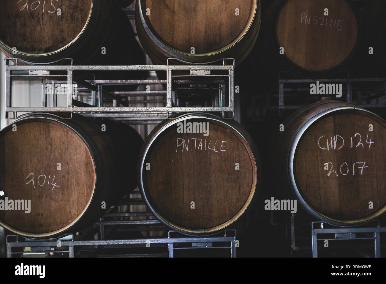 Oak wine barrels in a winery Stock Photo - Alamy
