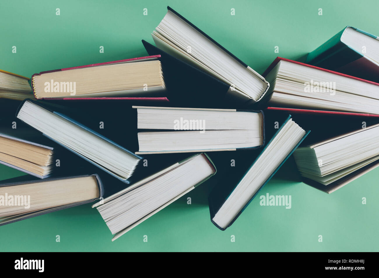 Arrangement of hardback books Stock Photo - Alamy