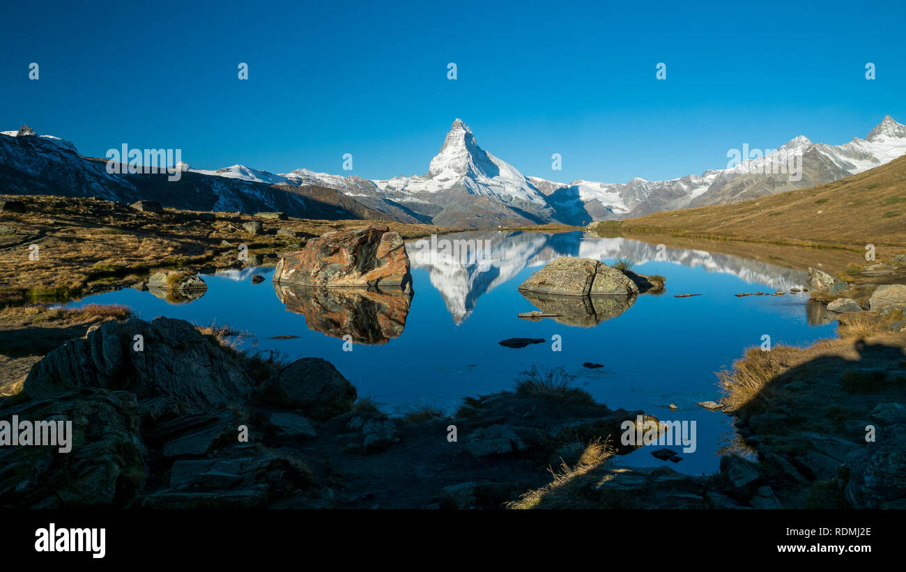 reflection of matterhorn in mountain lake Stock Photo - Alamy