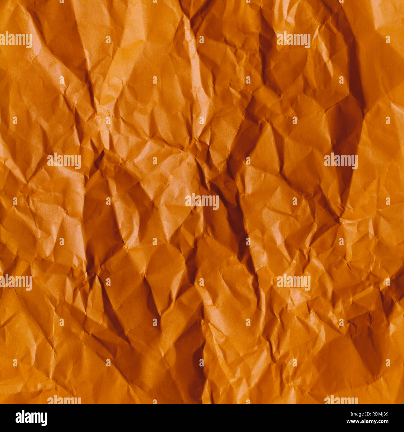 Wrinkled orange paper hi-res stock photography and images - Alamy