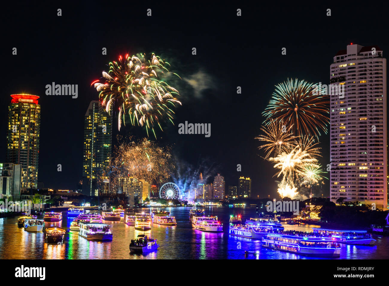 Fireworks at the river of city in New Year countdown time Stock Photo ...