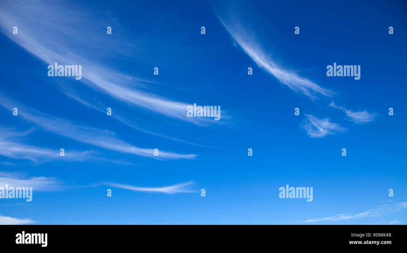 long wispy cirrus clouds natural sky background Stock Photo - Alamy