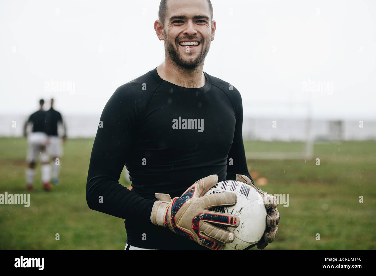Goalkeeper practicing on soccer field hi-res stock photography and ...