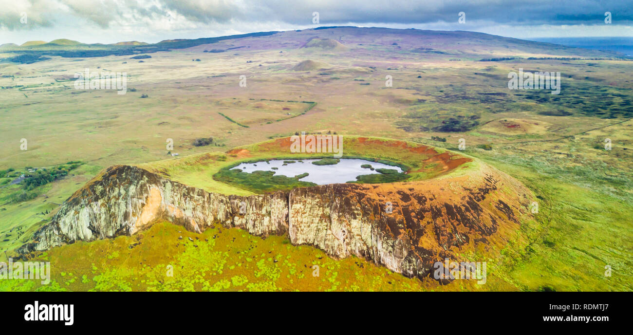 An amazing dreamlike aerial view of Rano Raraku Volcano and its crater ...