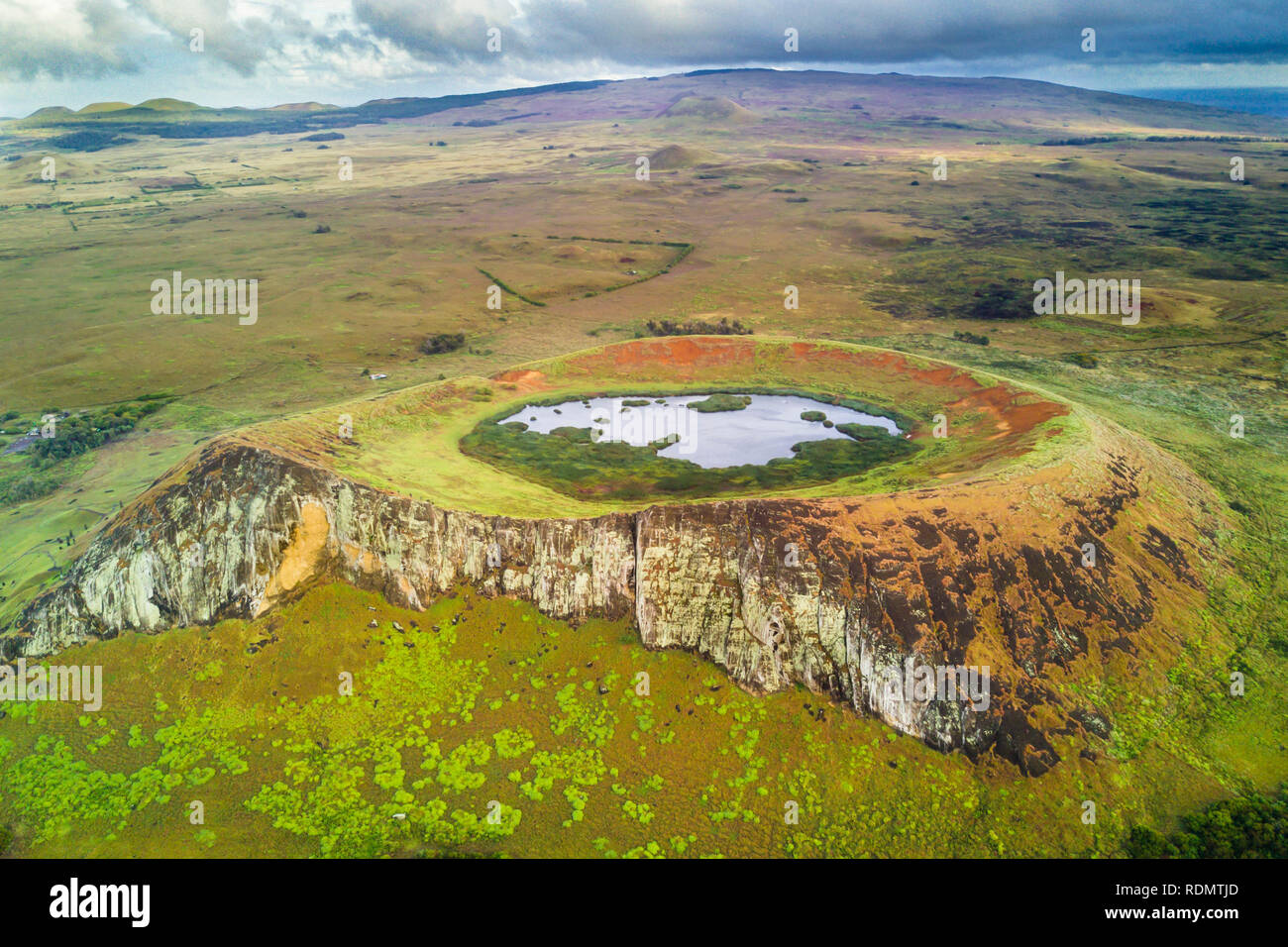 An amazing dreamlike aerial view of Rano Raraku Volcano and its crater ...