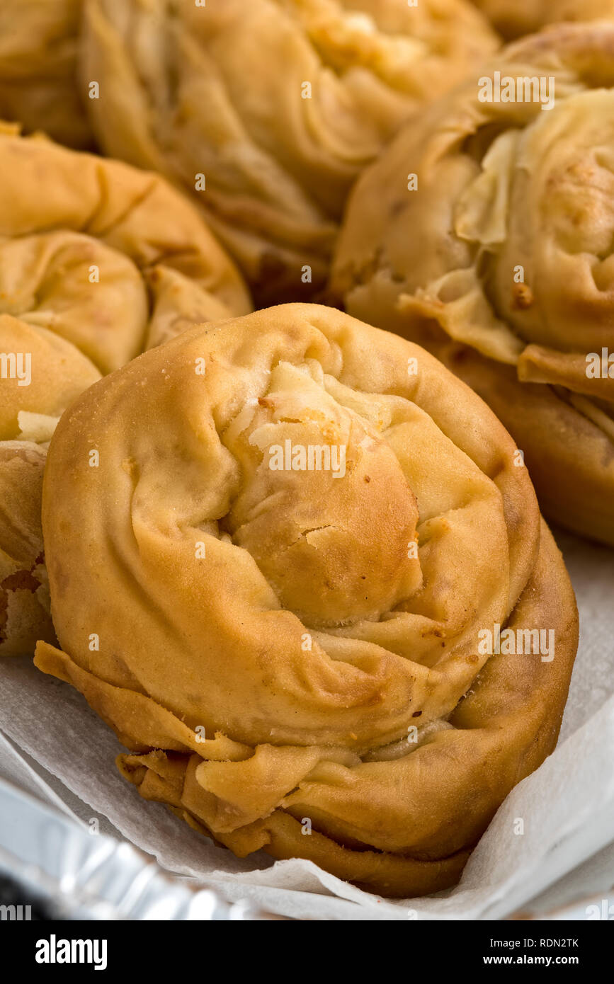 Baked homemade traditional Greek cheese pies Stock Photo - Alamy