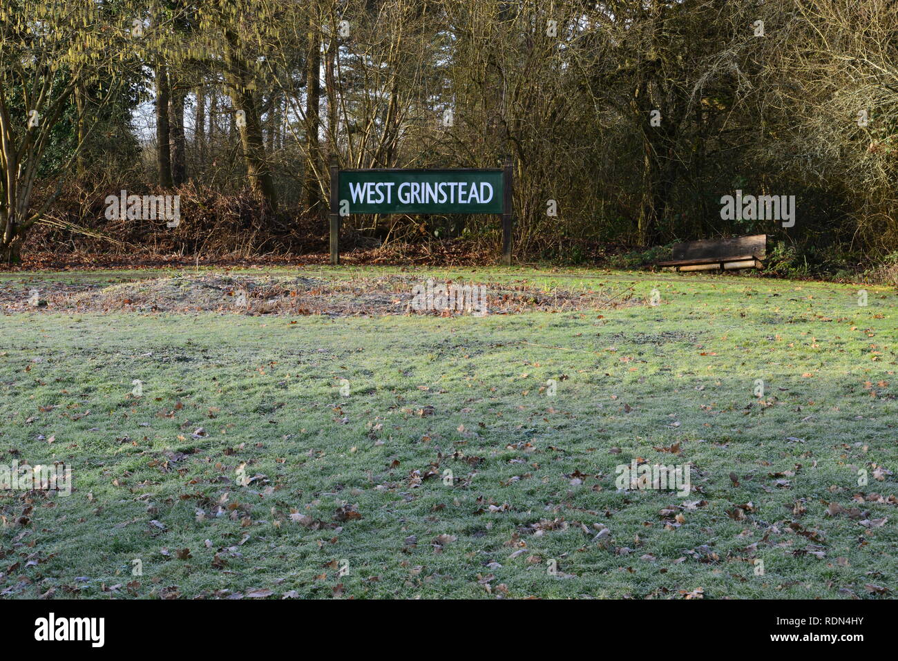 West Grinstead Station sign Stock Photo - Alamy