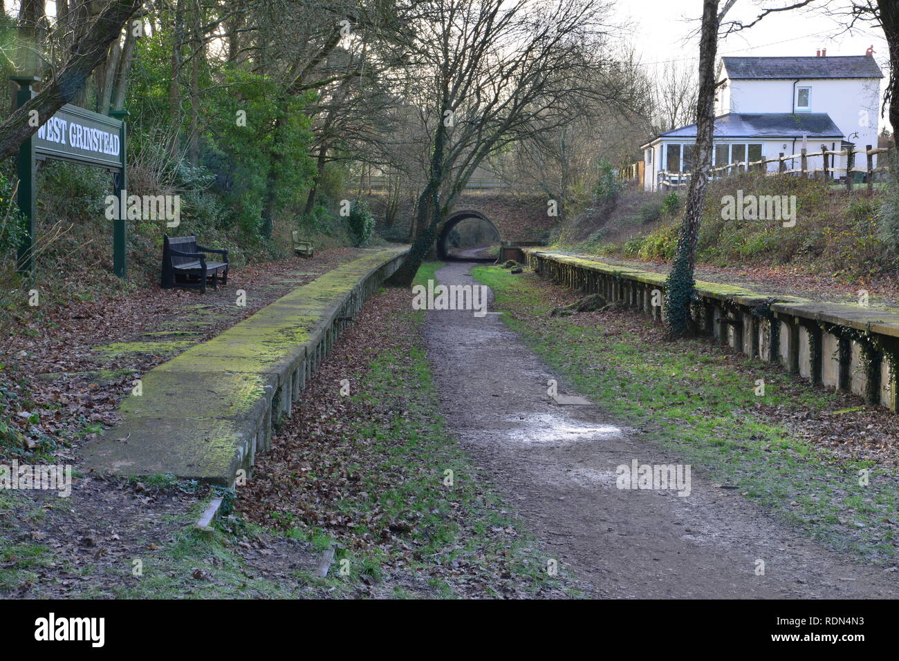 Closed and abandoned railway station at West Grinstead in West Sussex ...