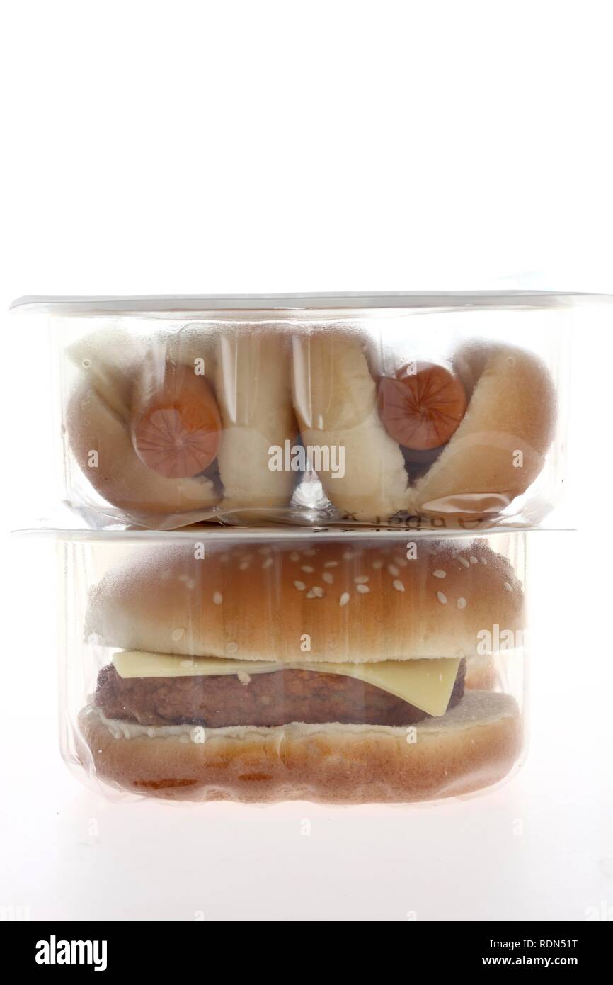 Hamburger, cheeseburger and hot dogs in clear plastic packaging Stock ...