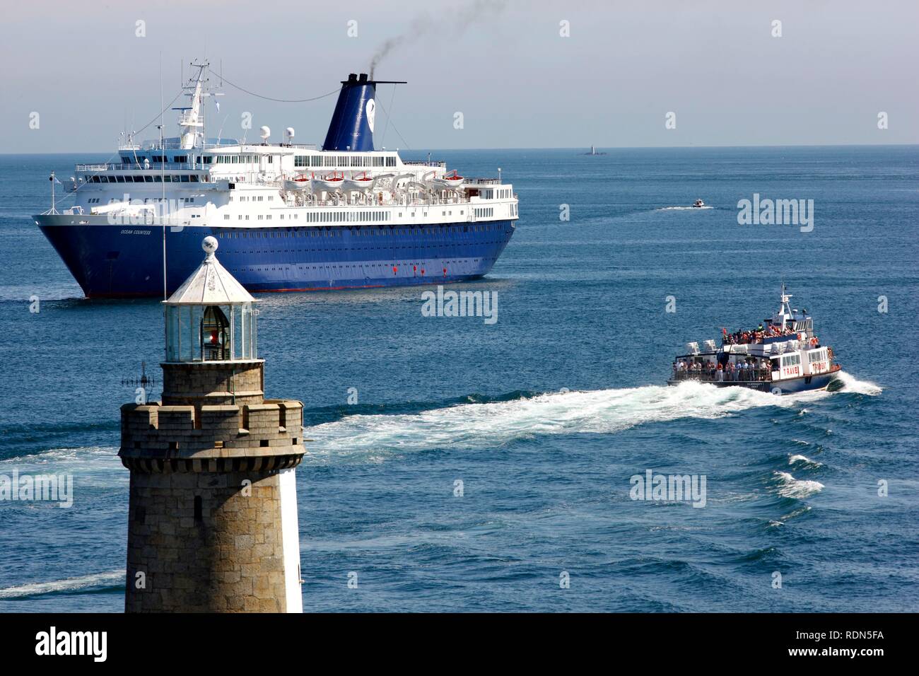 Cornet cruise ship at anchor, passenger ferry, off the pier with ...