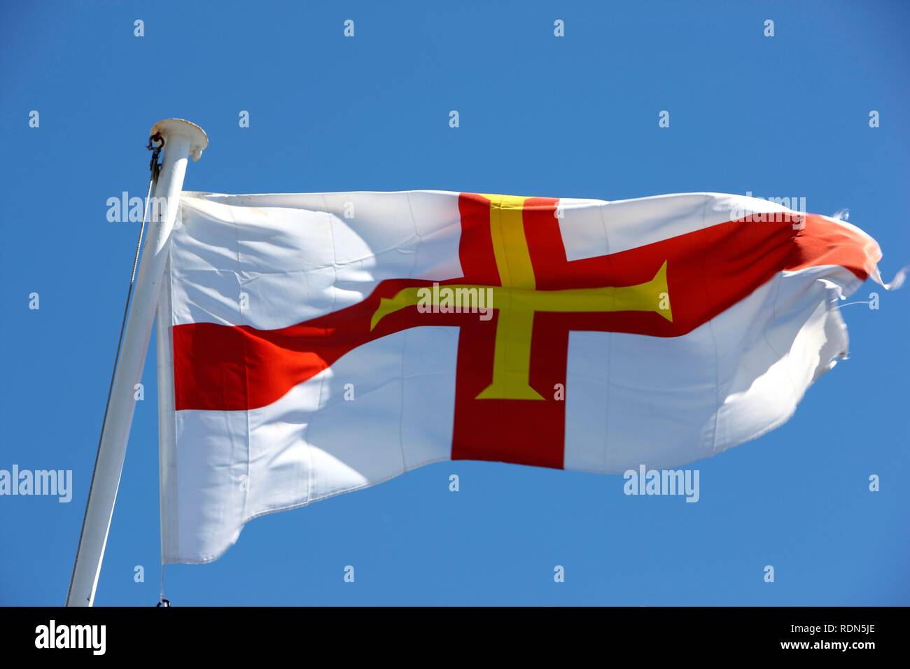 National flag guernsey yellow cross hi-res stock photography and images ...