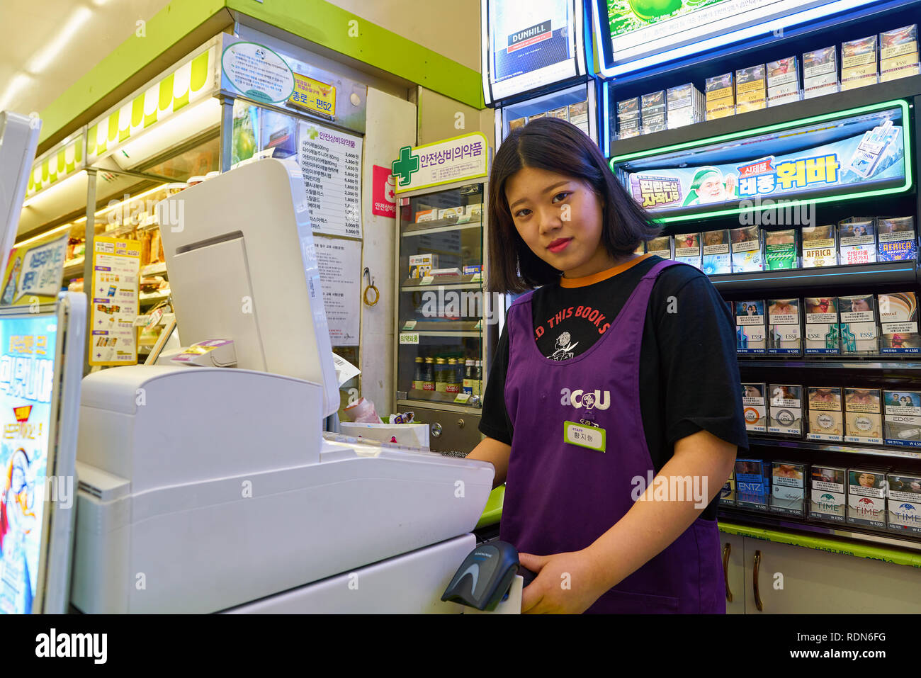 SEOUL, SOUTH KOREA - CIRCA MAY, 2017: worker at CU convenience store. CU is a convenience store ...