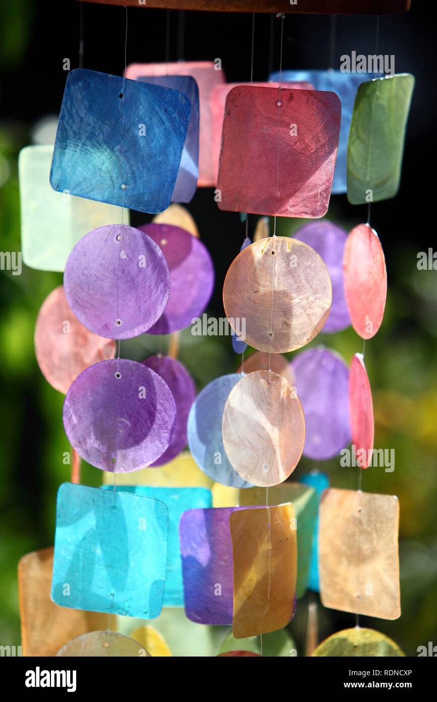 Colourful wind chime made of coloured plastic Stock Photo - Alamy