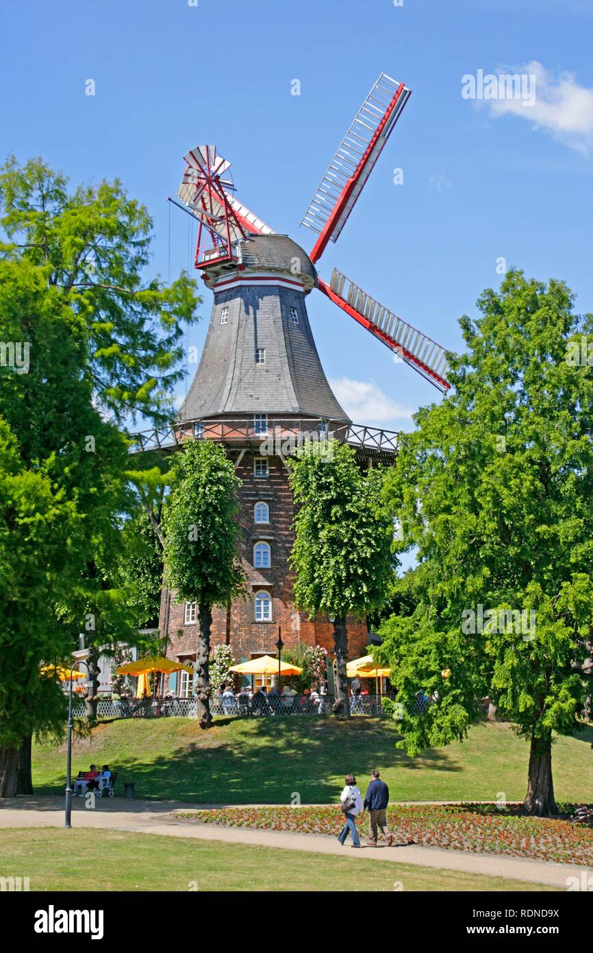 Human and windmill hi-res stock photography and images - Alamy