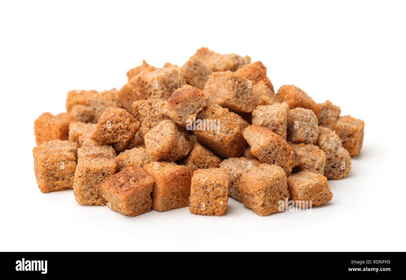 Pile of bread rusks isolated on white Stock Photo - Alamy