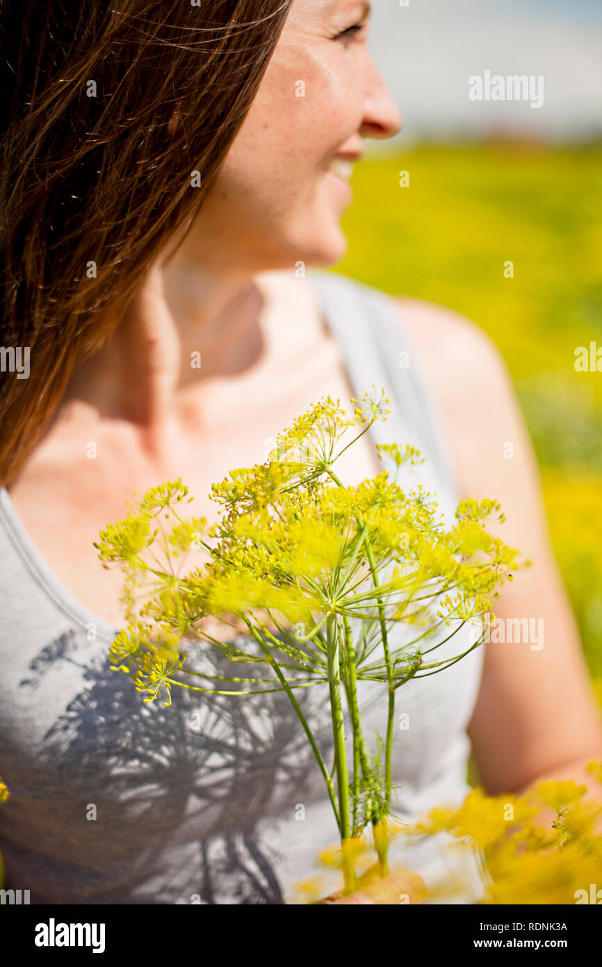 Woman herbs field hi-res stock photography and images - Alamy