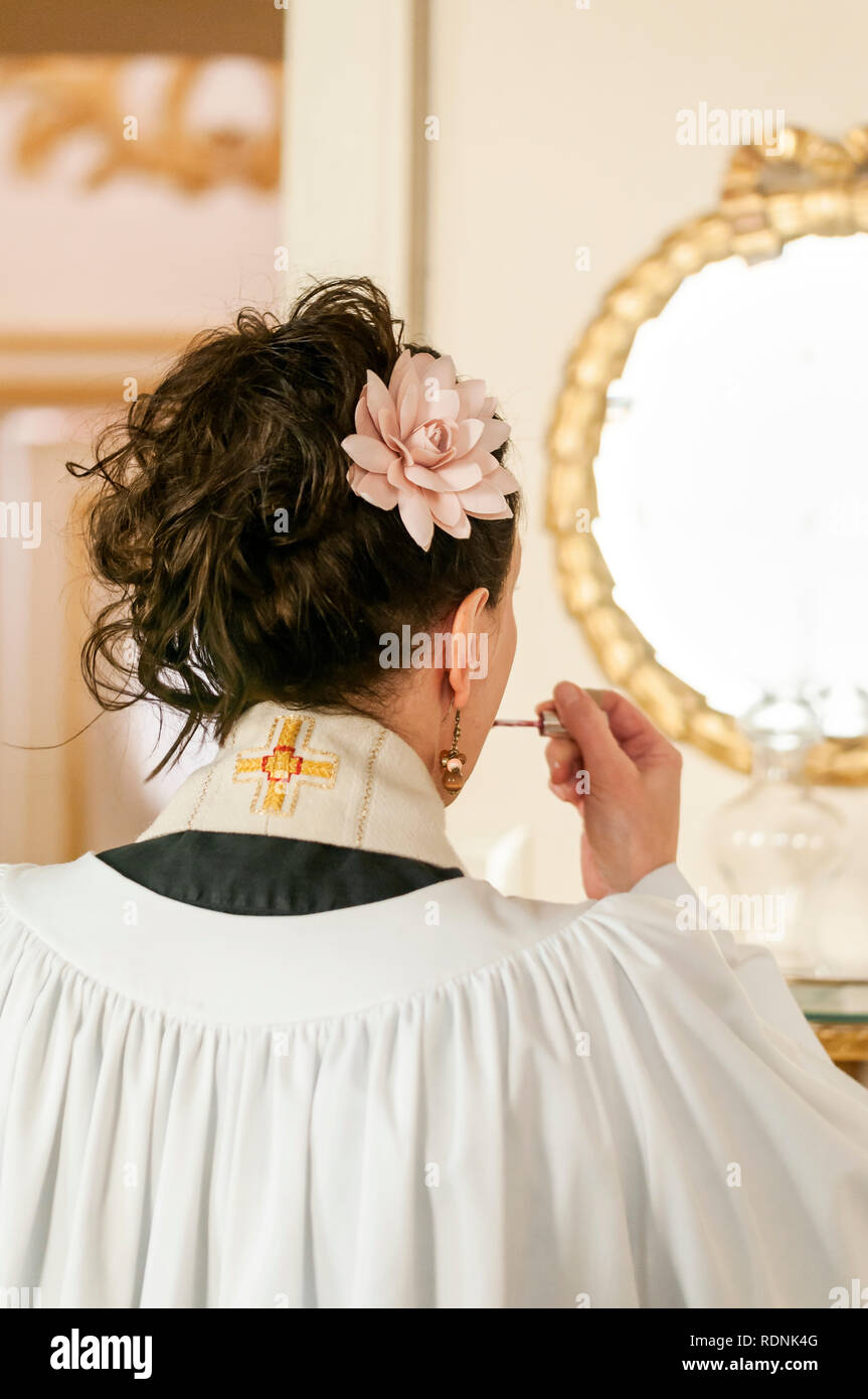 Female pastor, rear view Stock Photo - Alamy