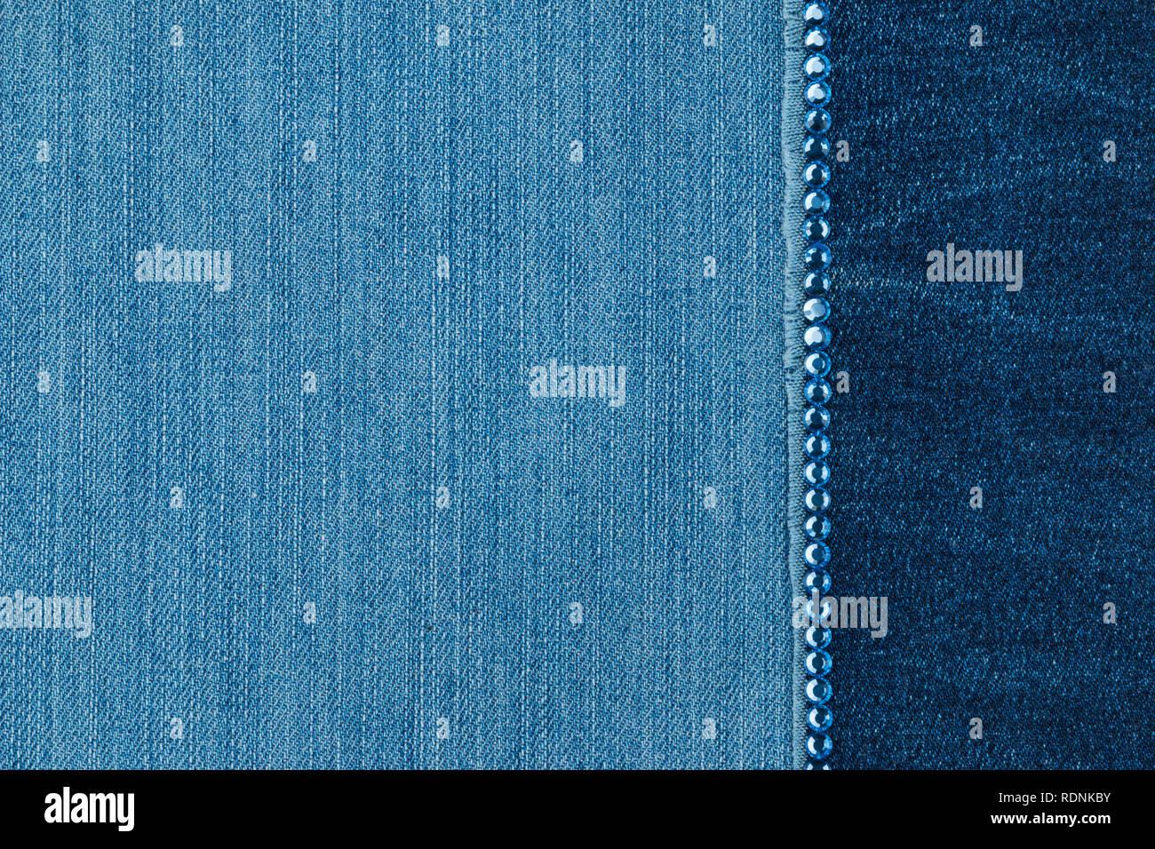 Trendy background with a line of blue rhinestones. With empty space ...