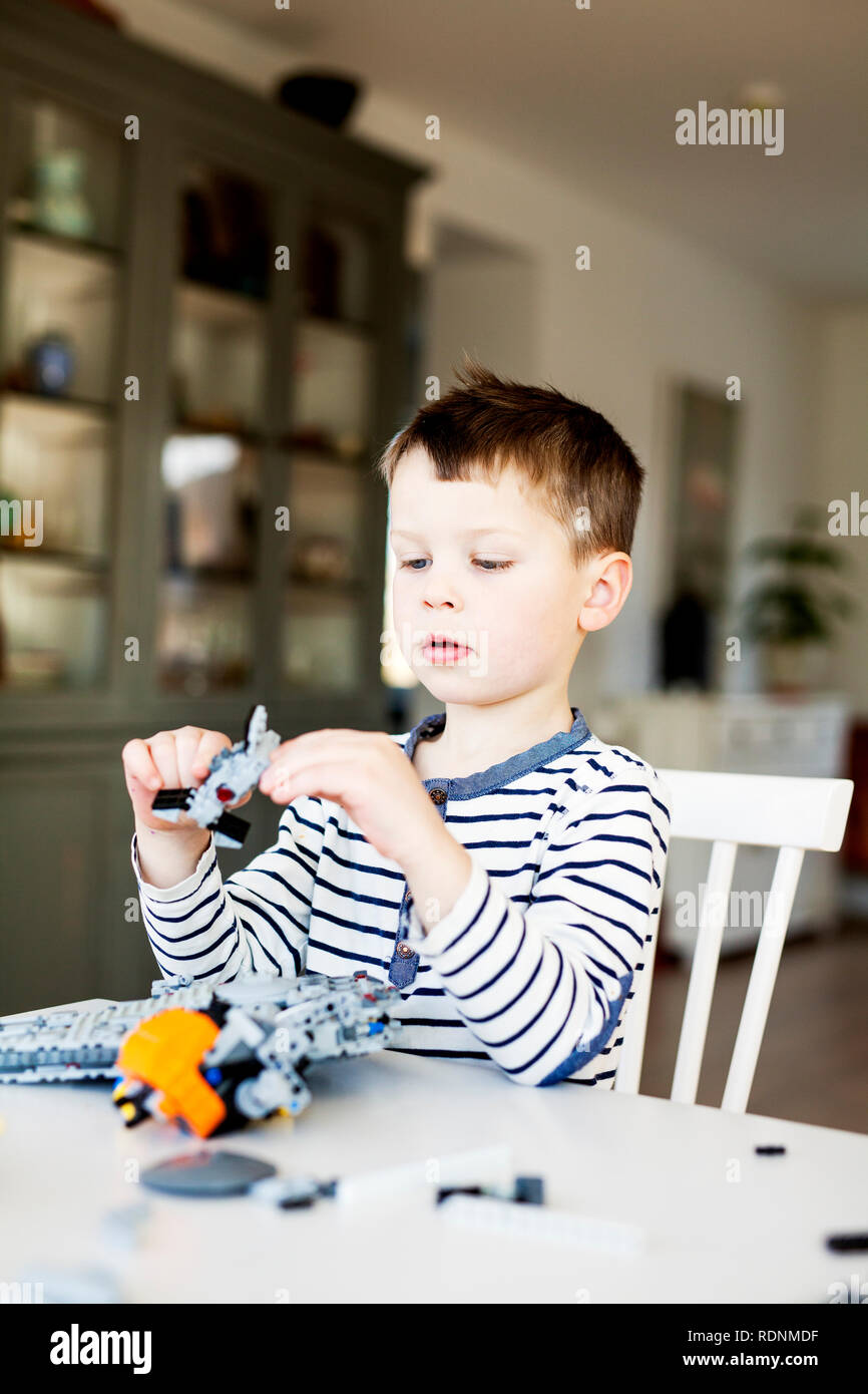 boy playing with lego Stock Photo - Alamy