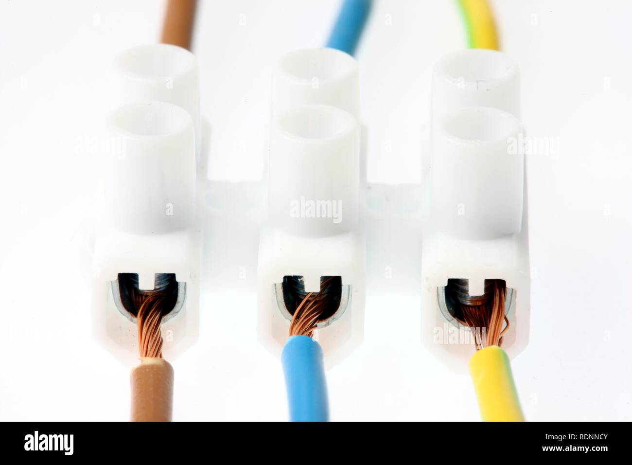 Insulation screw joint with various cables Stock Photo - Alamy