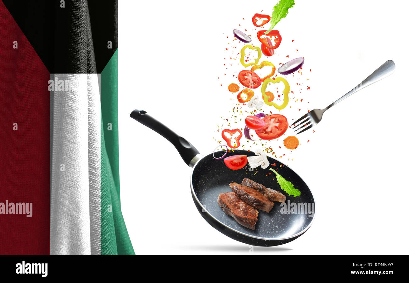 Frying pan with falling vegetables and meat, isolated objects. On the ...