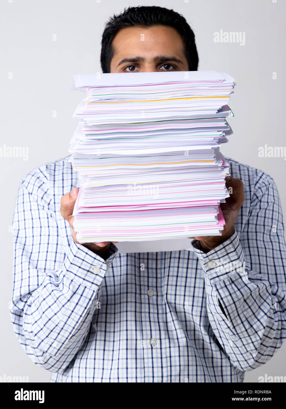 Woman files carrying pile hi-res stock photography and images - Alamy
