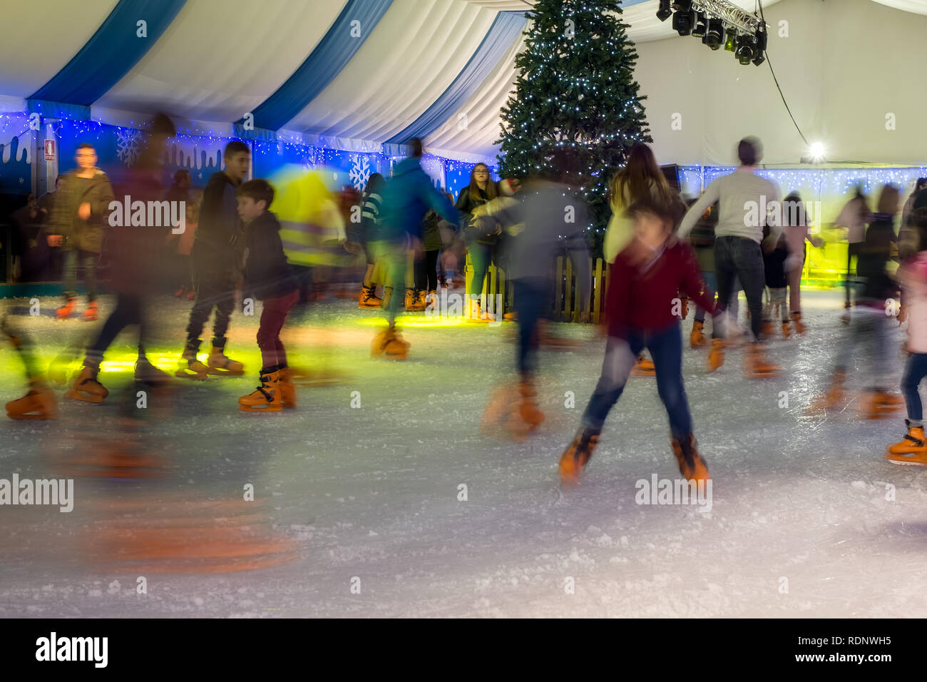 Kids having fun on the Ice rink Stock Photo - Alamy