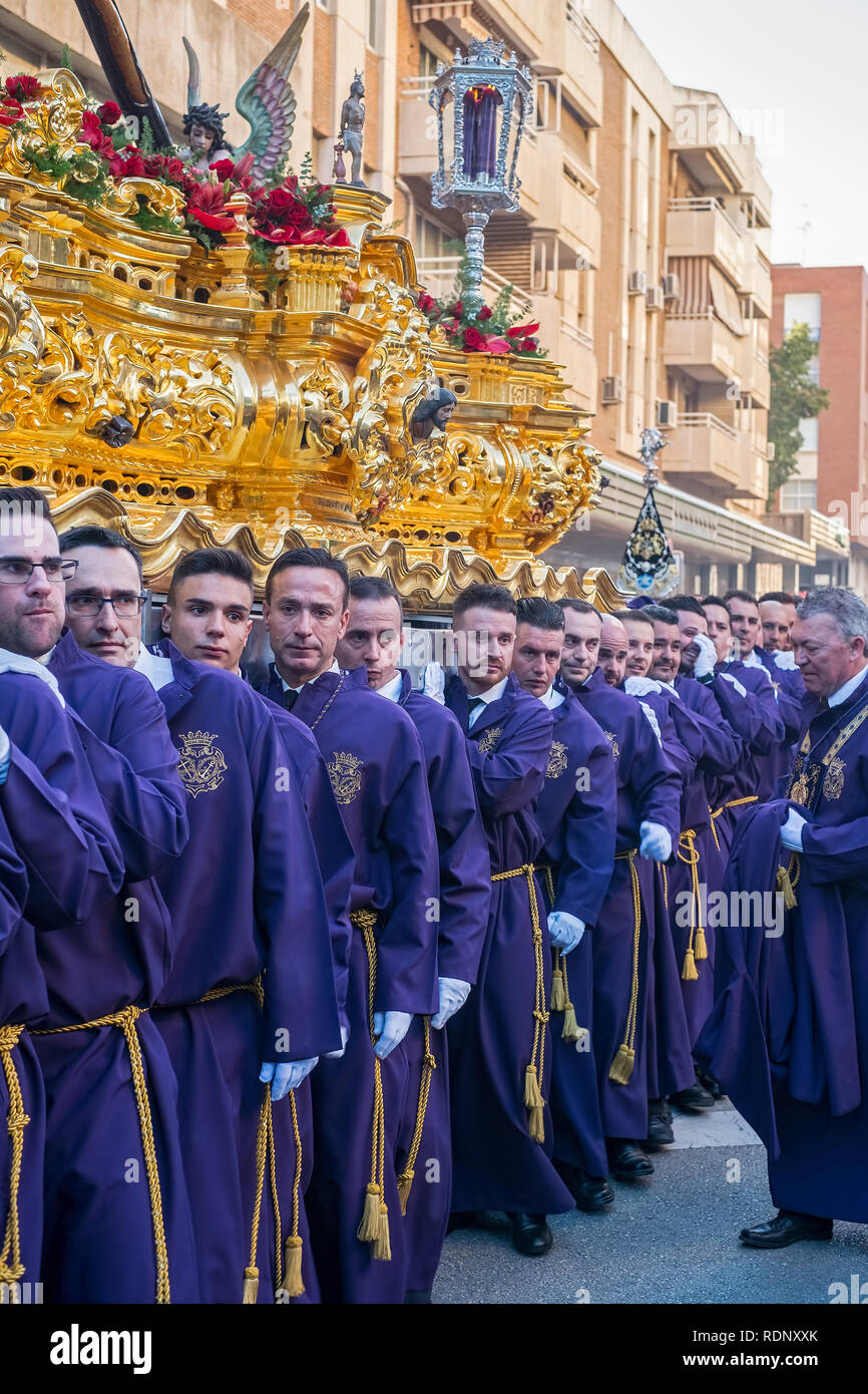 People participating in the famous procession in the Holy Week in a ...