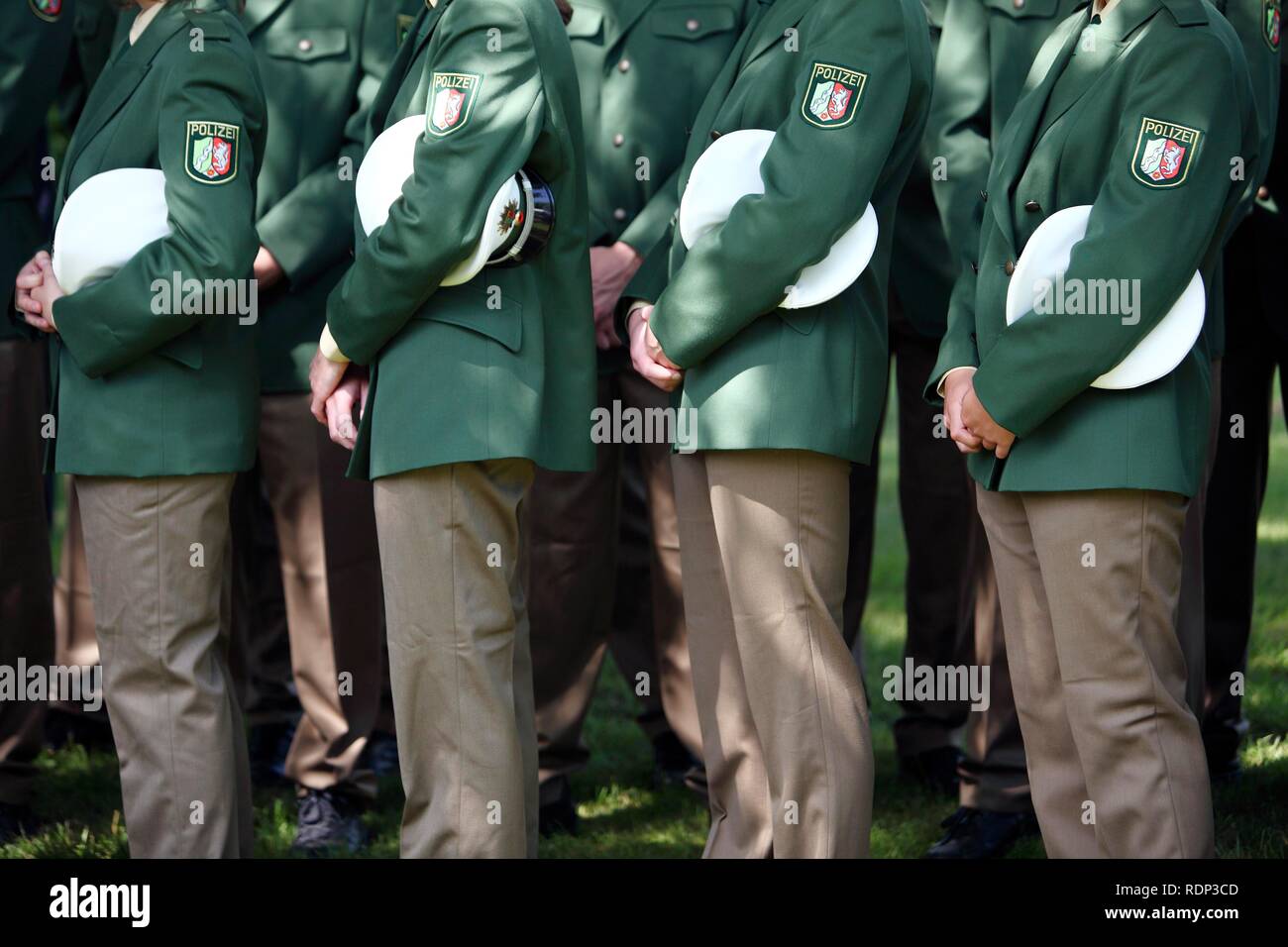 Carrying under arms hi-res stock photography and images - Alamy