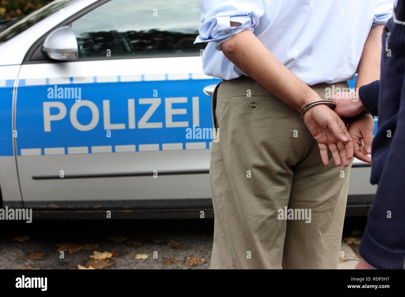 Arrested handcuffs man police hi-res stock photography and images - Alamy