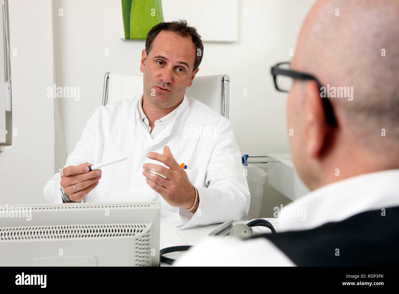 Doctor gp patient surgery hi-res stock photography and images - Alamy